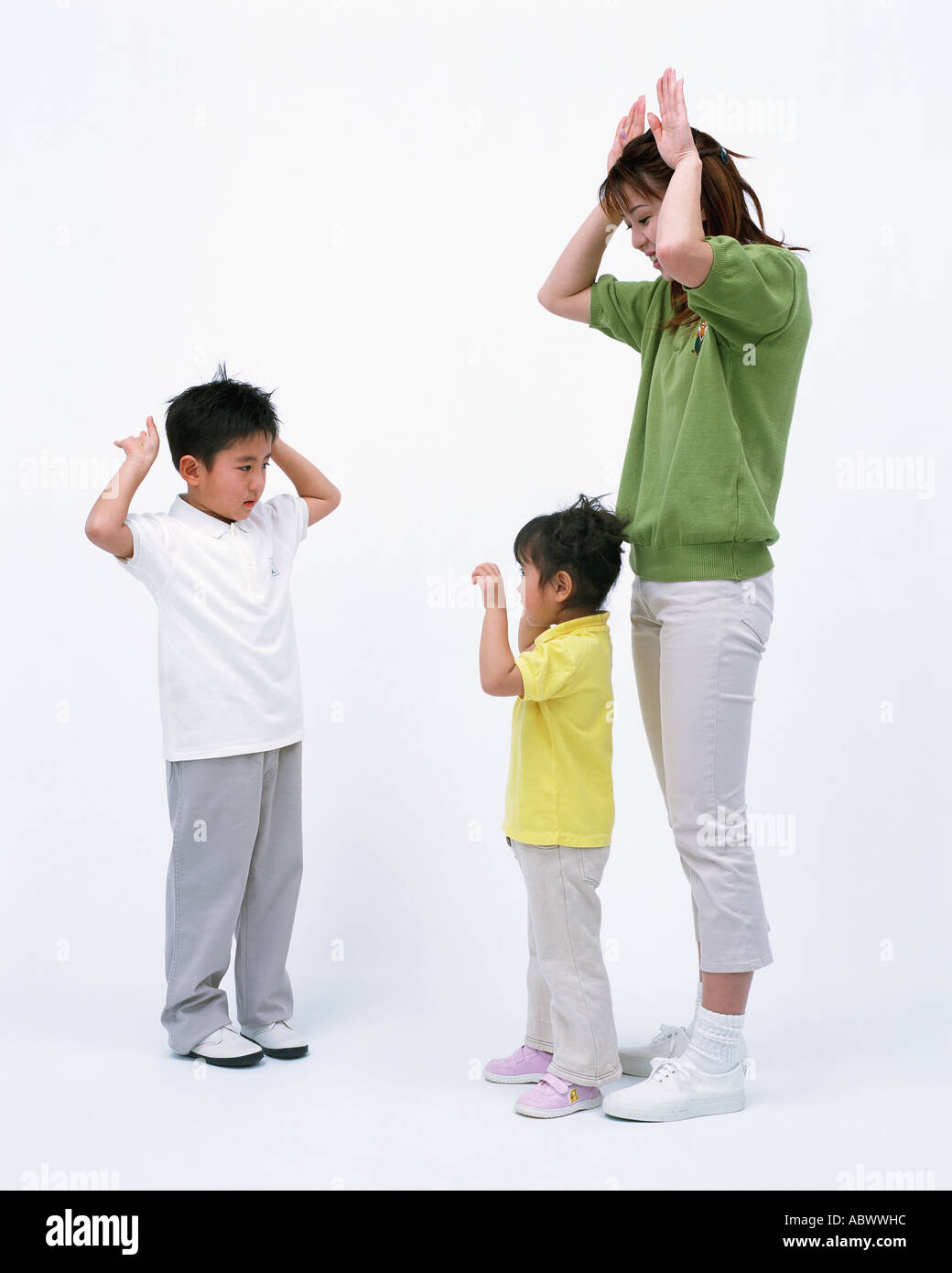 Black child white child raising hands hi-res stock photography and ...