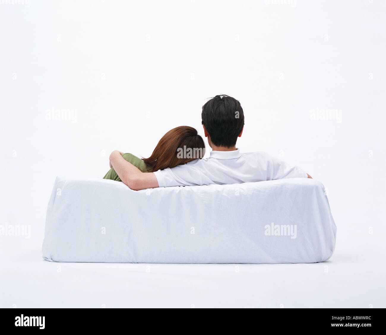 Japanese couple resting on sofa hi-res stock photography and images - Alamy