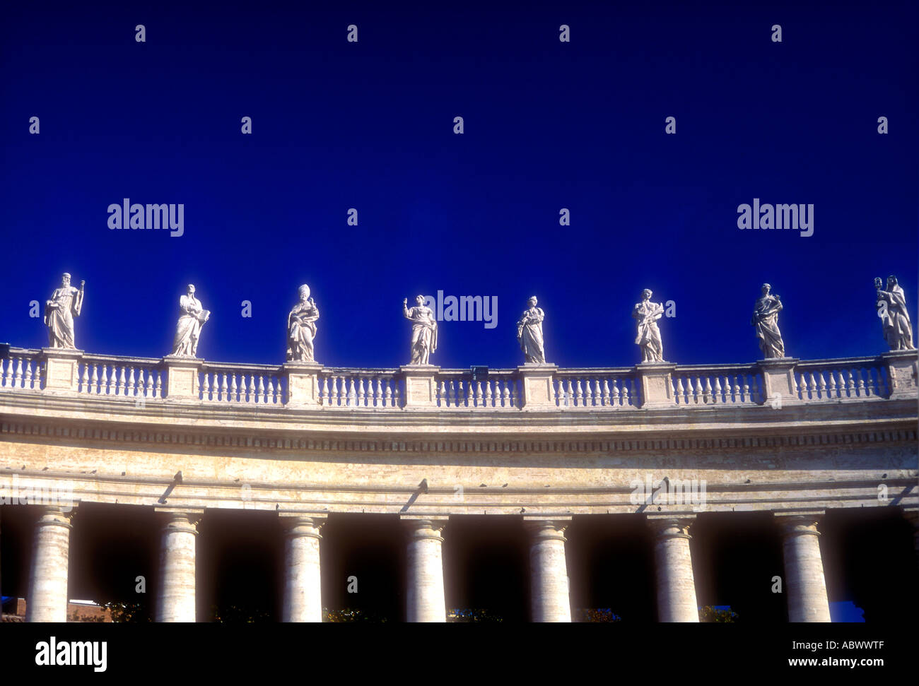 Statues on the Bernini Colonnade of St Peters. St Peters Square Vatican ...