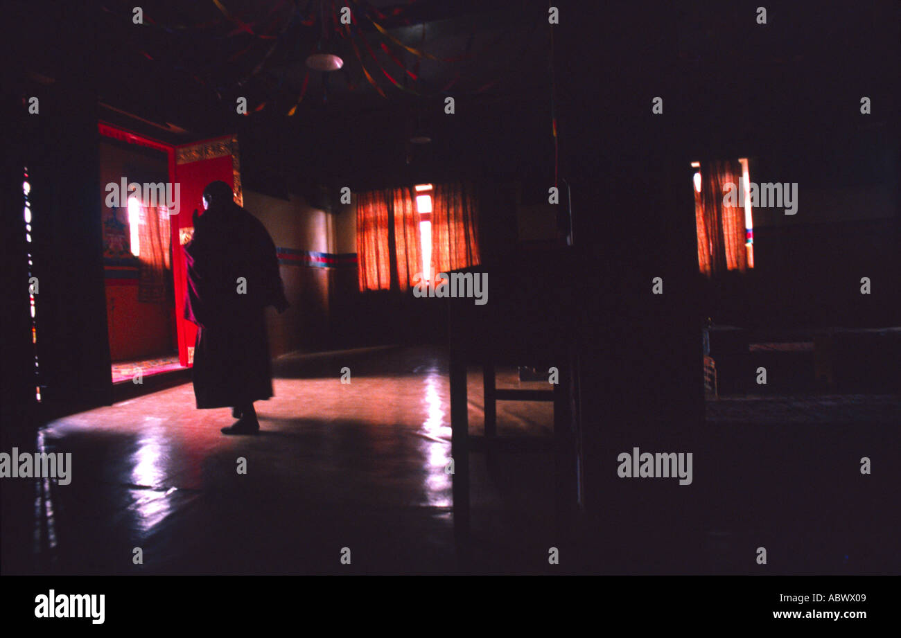 a monk leaving a room spiti india Stock Photo - Alamy