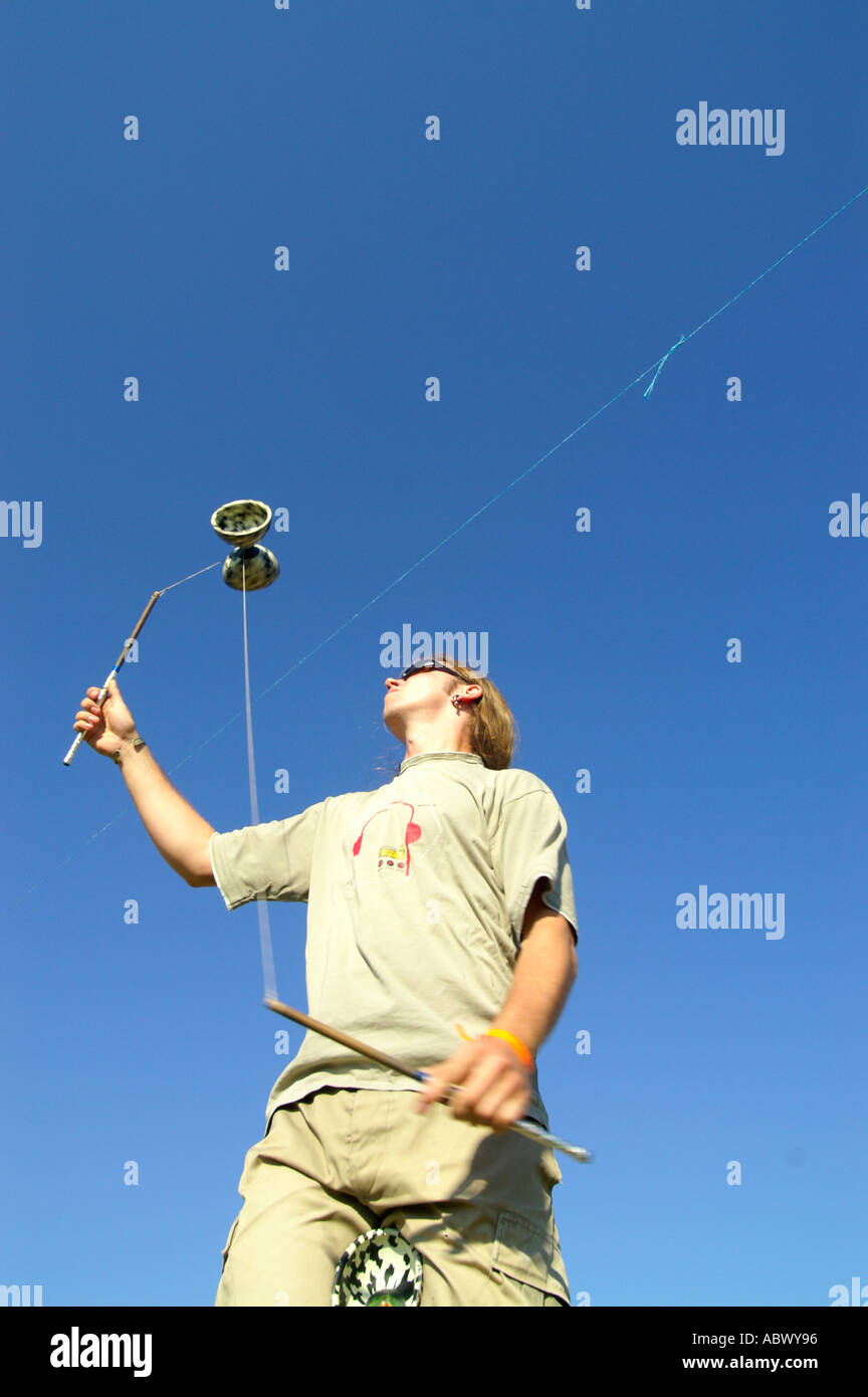 Man Dancing at Lipovec HillTop Festival rave party outdoors under blue ...