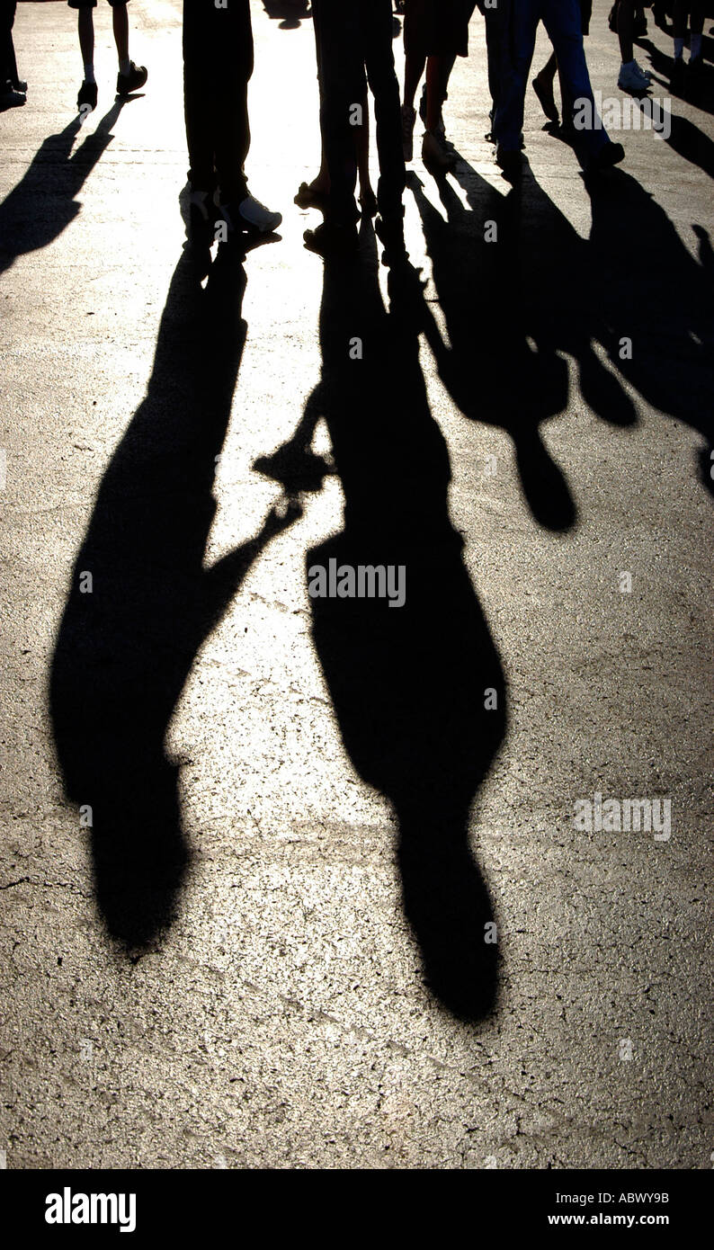 Two men and shadow Stock Photo - Alamy