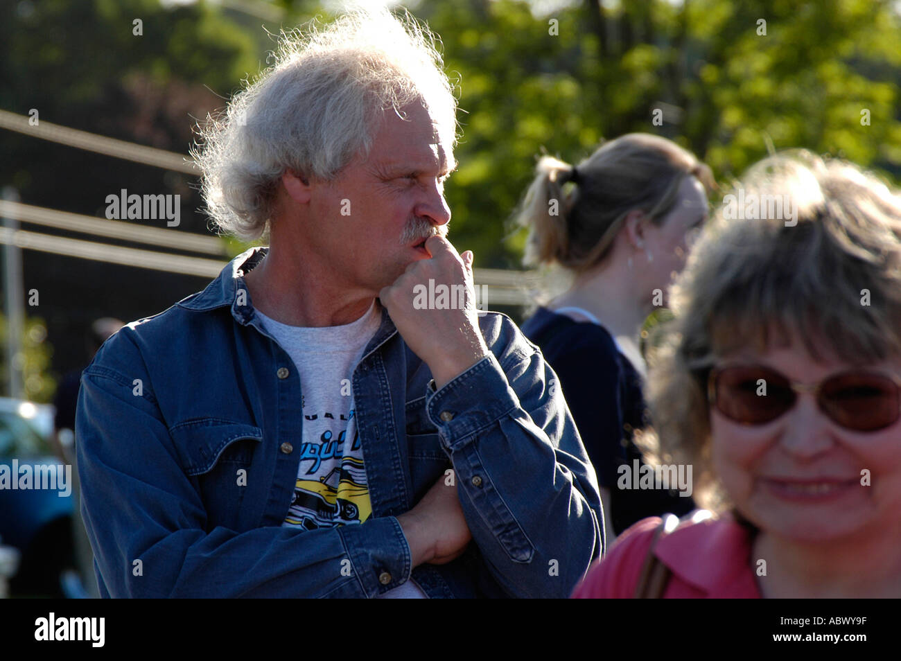 Gray haired man thinking Stock Photo - Alamy