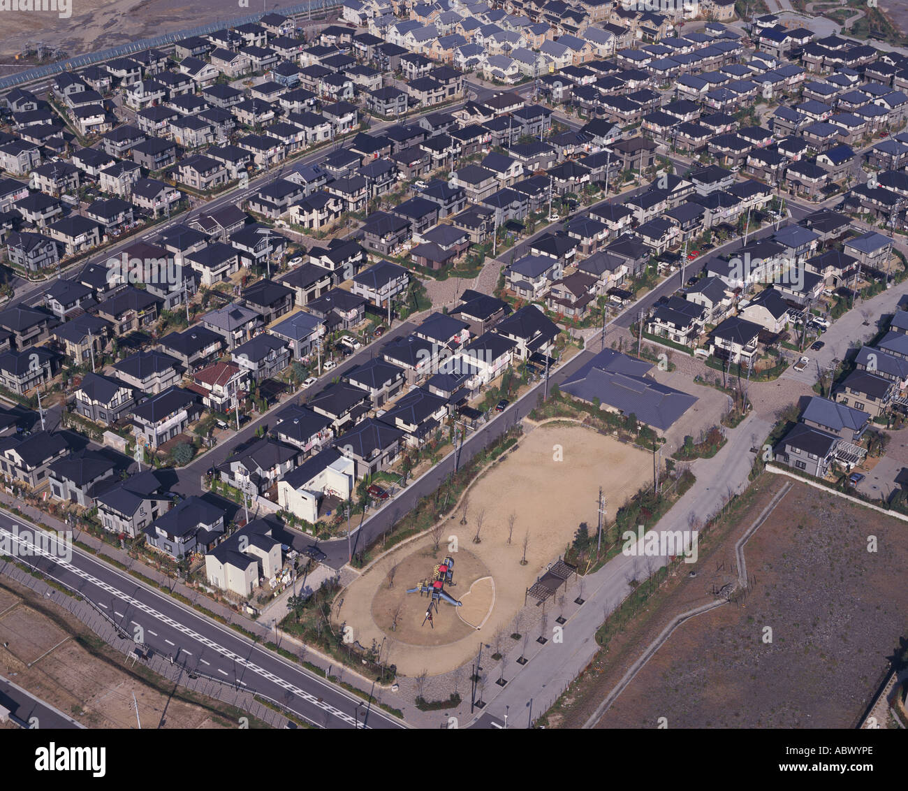 Aerial view of similar houses close to each other Stock Photo - Alamy