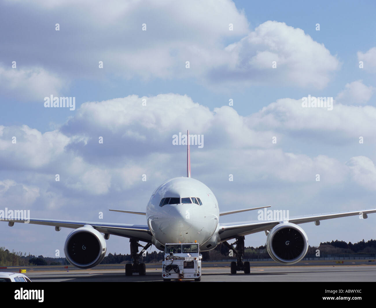 Front view of a huge plane on the runway Stock Photo - Alamy