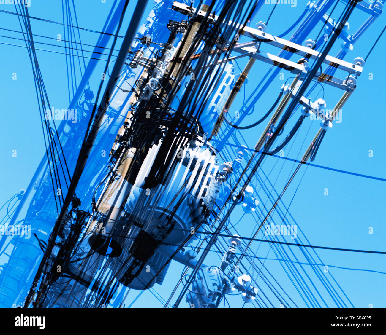 Low angle view of large group of transmission lines Stock Photo - Alamy