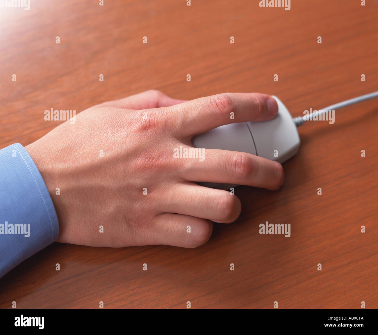Close up of a person s hand holding computer mouse Stock Photo - Alamy