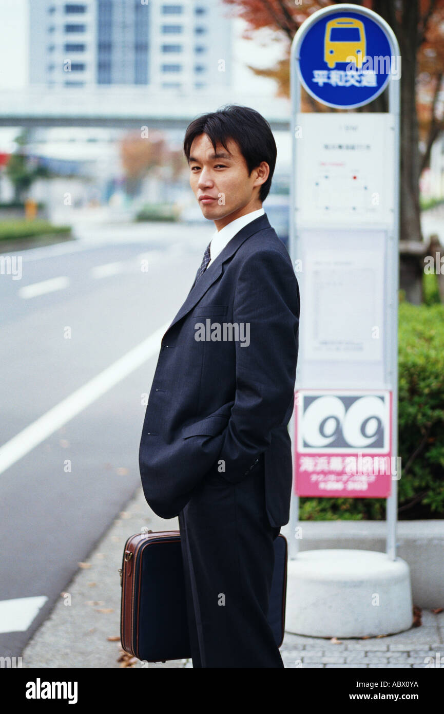 Three men waiting for a bus hi-res stock photography and images - Alamy