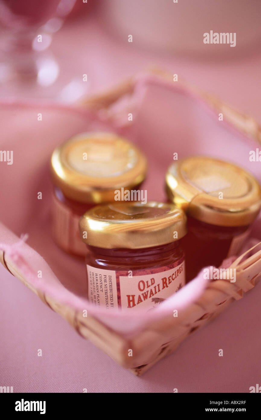 Jars of jam in a basket Stock Photo - Alamy