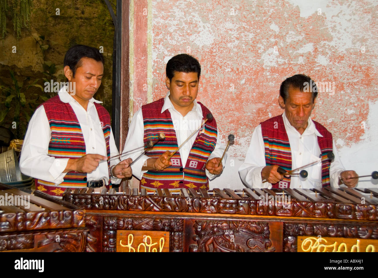 Colorful band playing music for tourists with instruments in Antigua ...