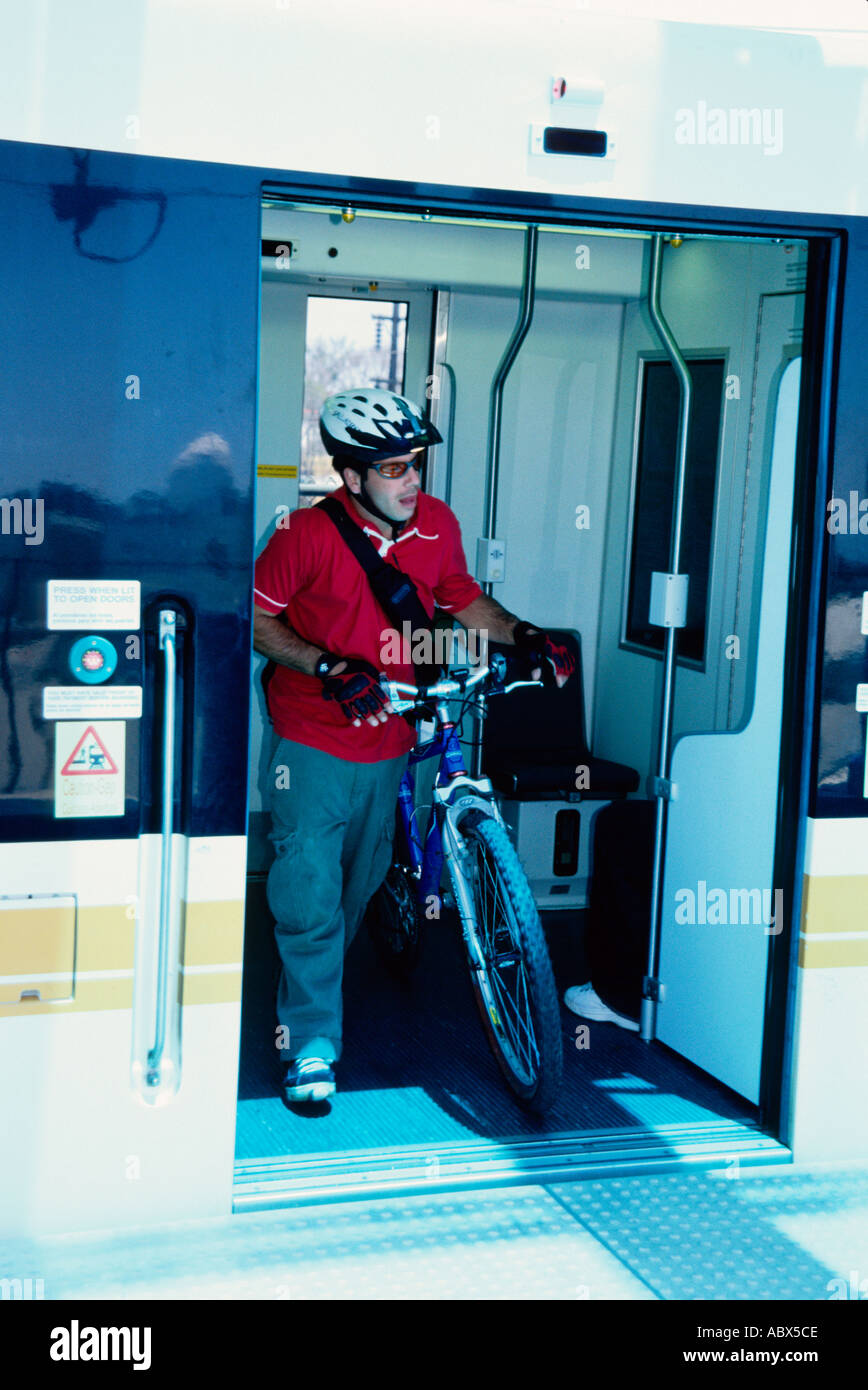 a young man on a commuter urban city metro train Stock Photo - Alamy