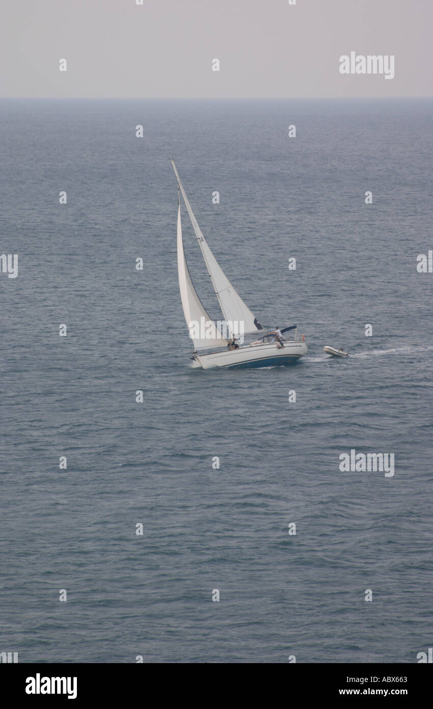 Sailing boat keeled over Stock Photo - Alamy