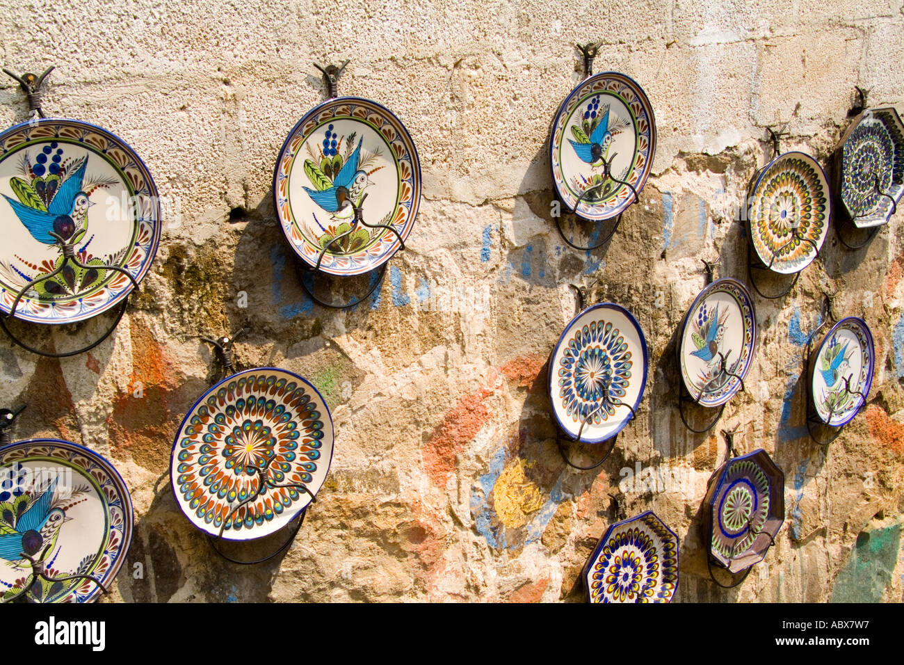 Artwork plates on wall display in San Antonio on remote Lake Atitlan in ...
