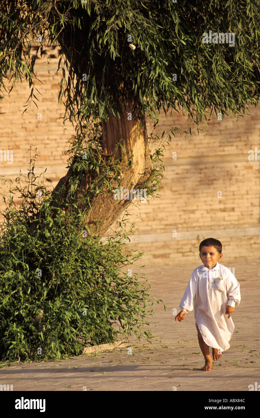 Pakistan, Multan, Young boy playing in courtyard Stock Photo - Alamy
