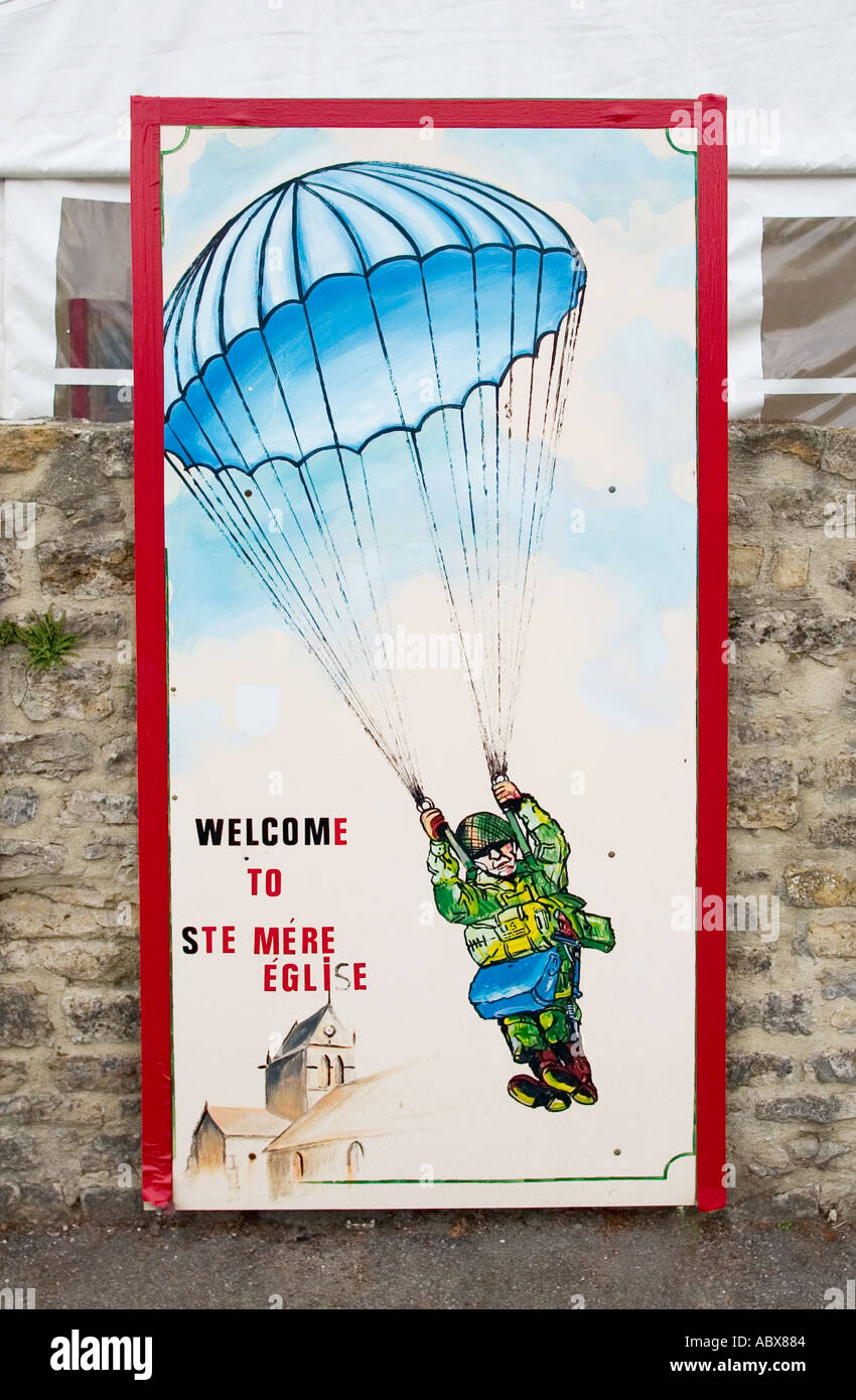 Welcome sign depicting paratrooper St Mere Eglise Normandy France Stock ...