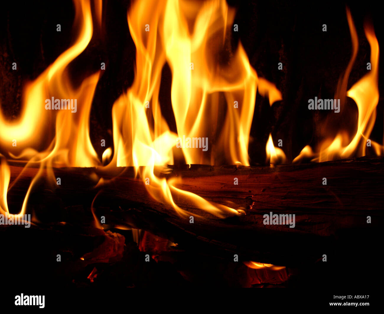 Fire burning in a chimney Stock Photo - Alamy