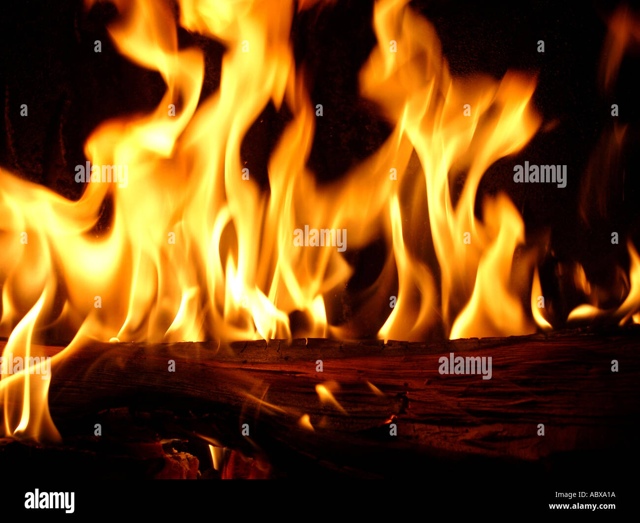 Fire burning in a chimney Stock Photo - Alamy