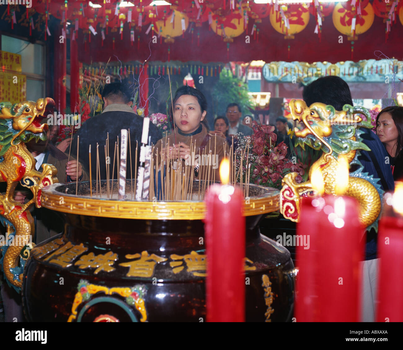 People praying at temple Stock Photo - Alamy