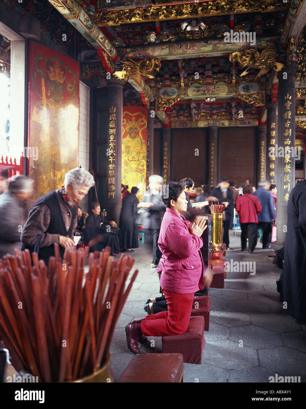 People praying at temple Stock Photo - Alamy
