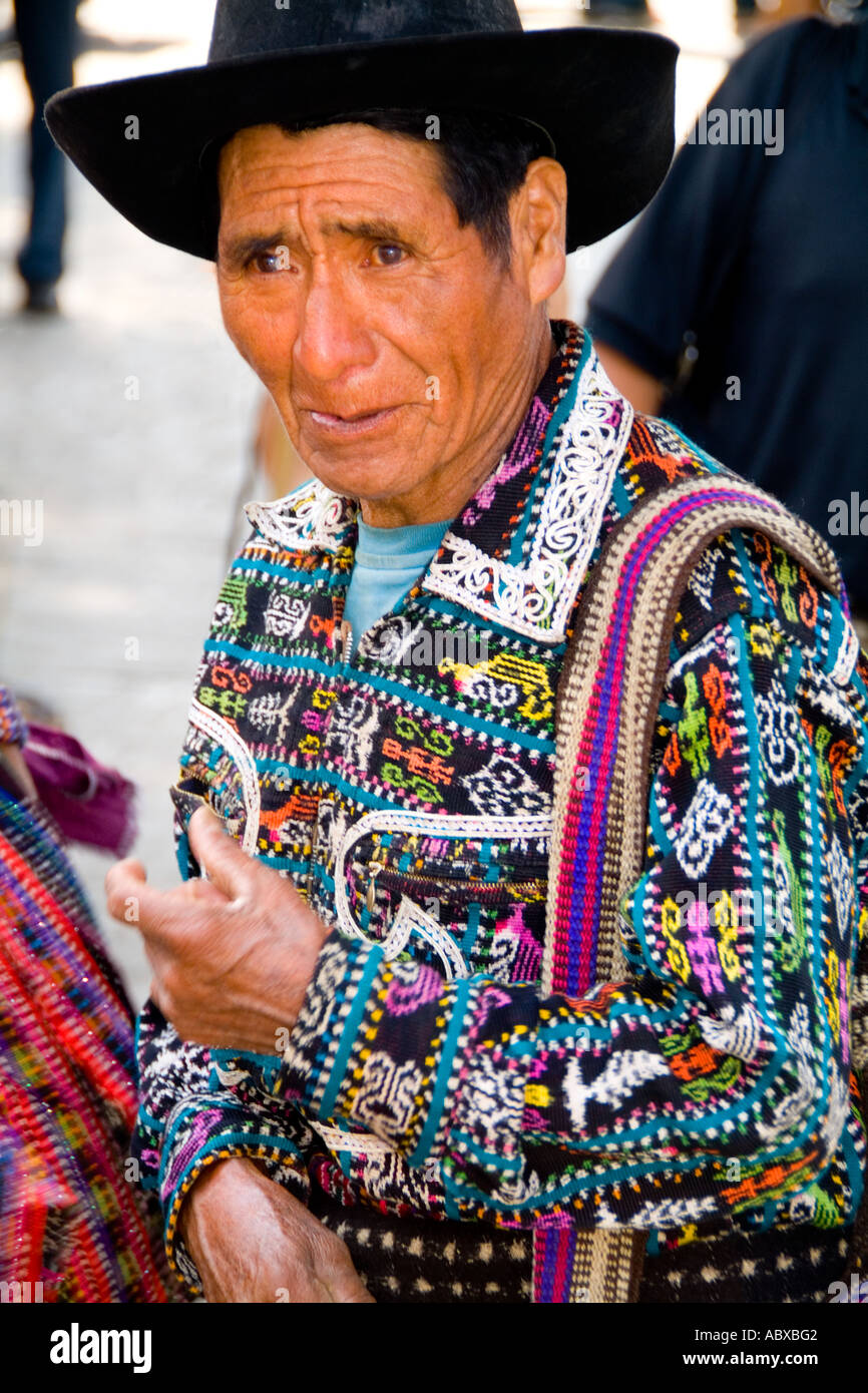Colorful print patterned clothes of men in the famous market day color ...