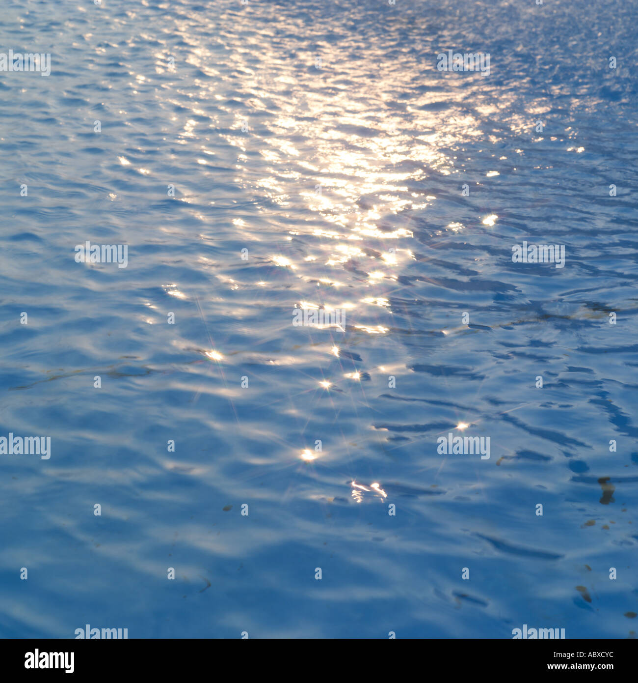 Sunlight reflected on water surface Stock Photo - Alamy
