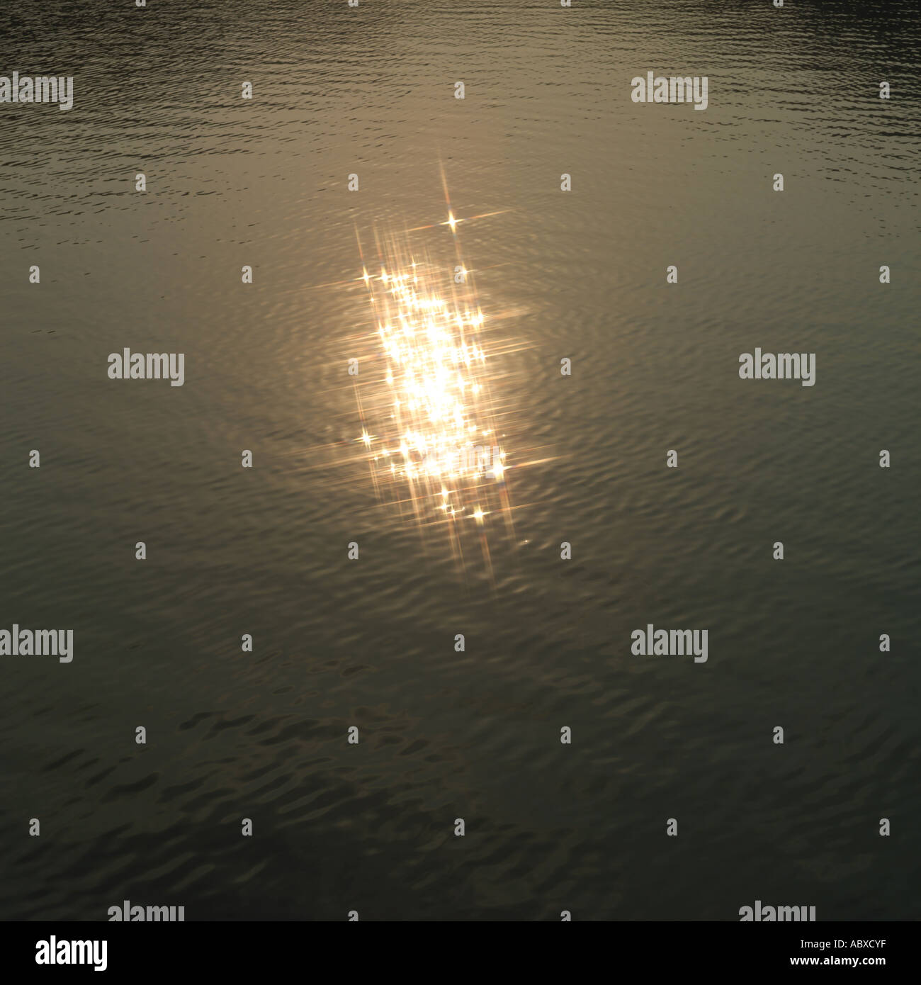 Sunlight reflected on water surface Stock Photo - Alamy
