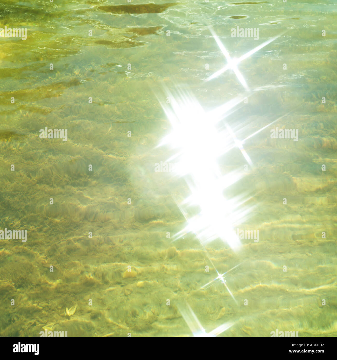Sunlight reflected on water surface Stock Photo - Alamy