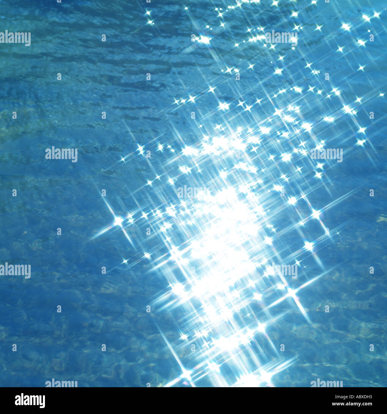 Sunlight reflected on water surface Stock Photo - Alamy