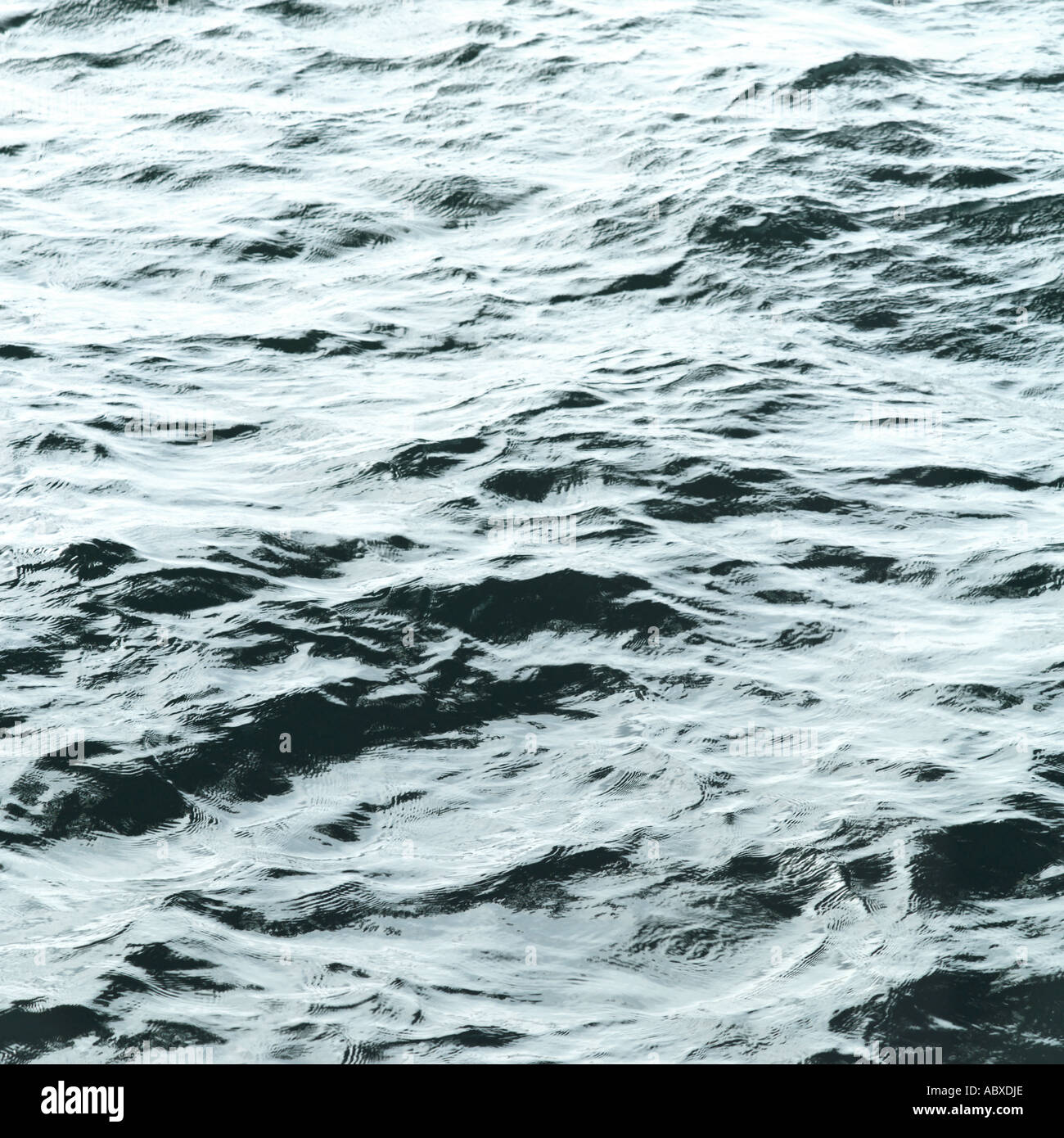 Placid water surface Stock Photo - Alamy