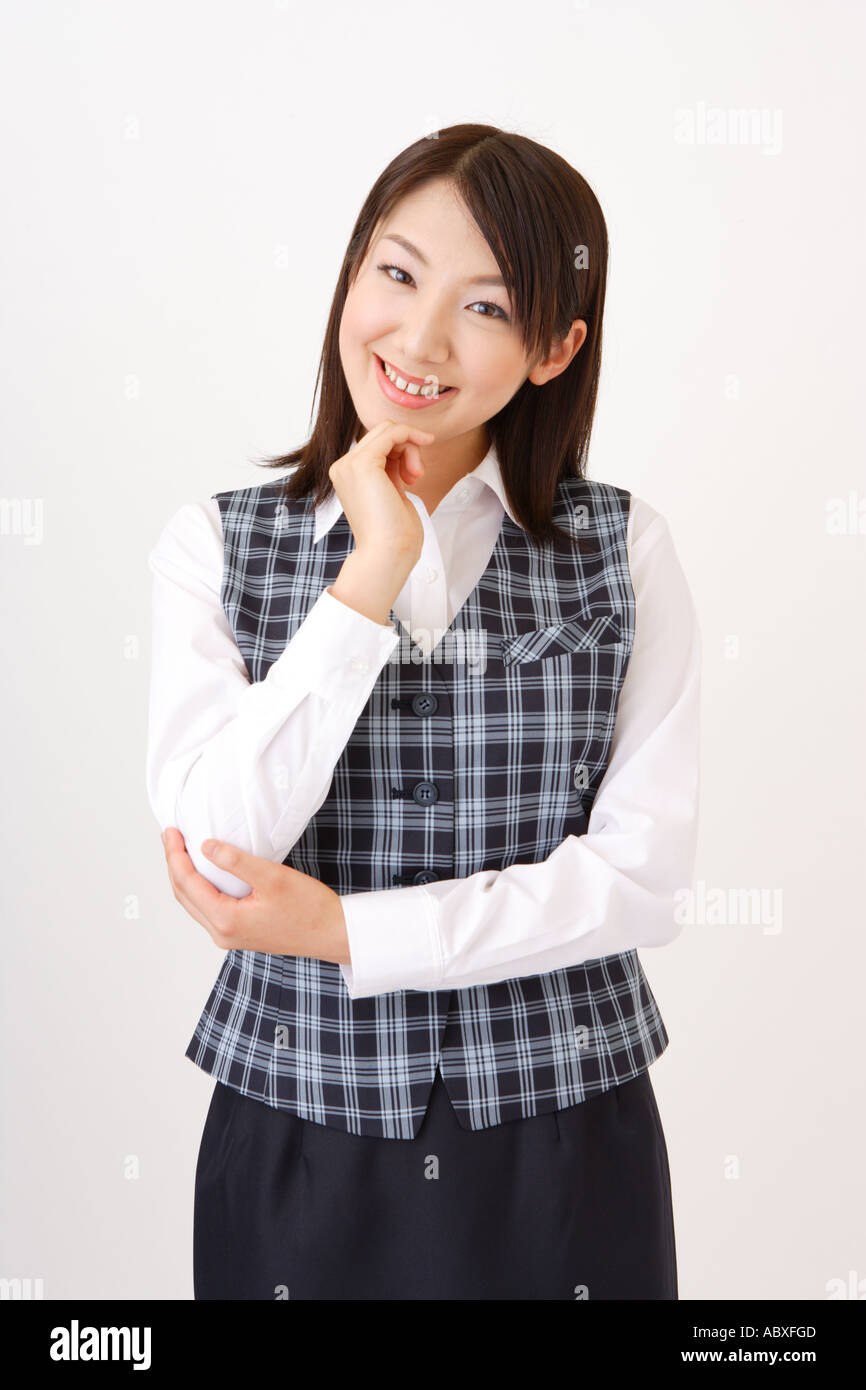 A woman in formal attire smiling Stock Photo - Alamy