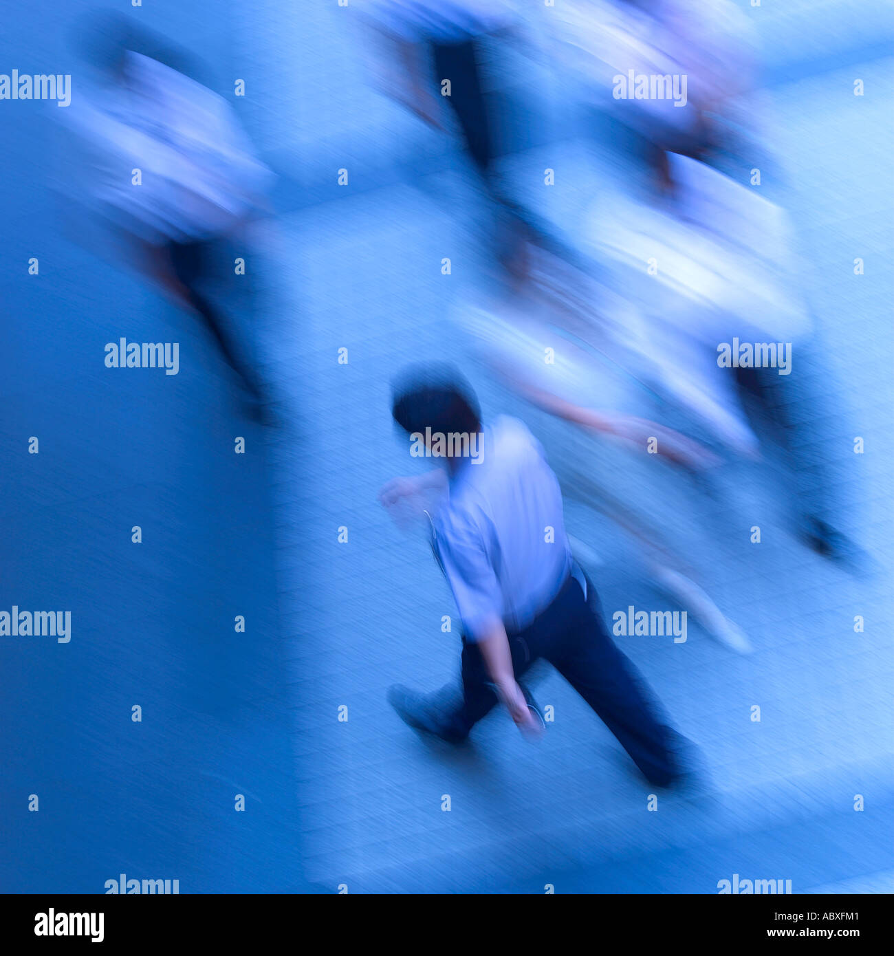 People walking on street blurred motion Stock Photo - Alamy