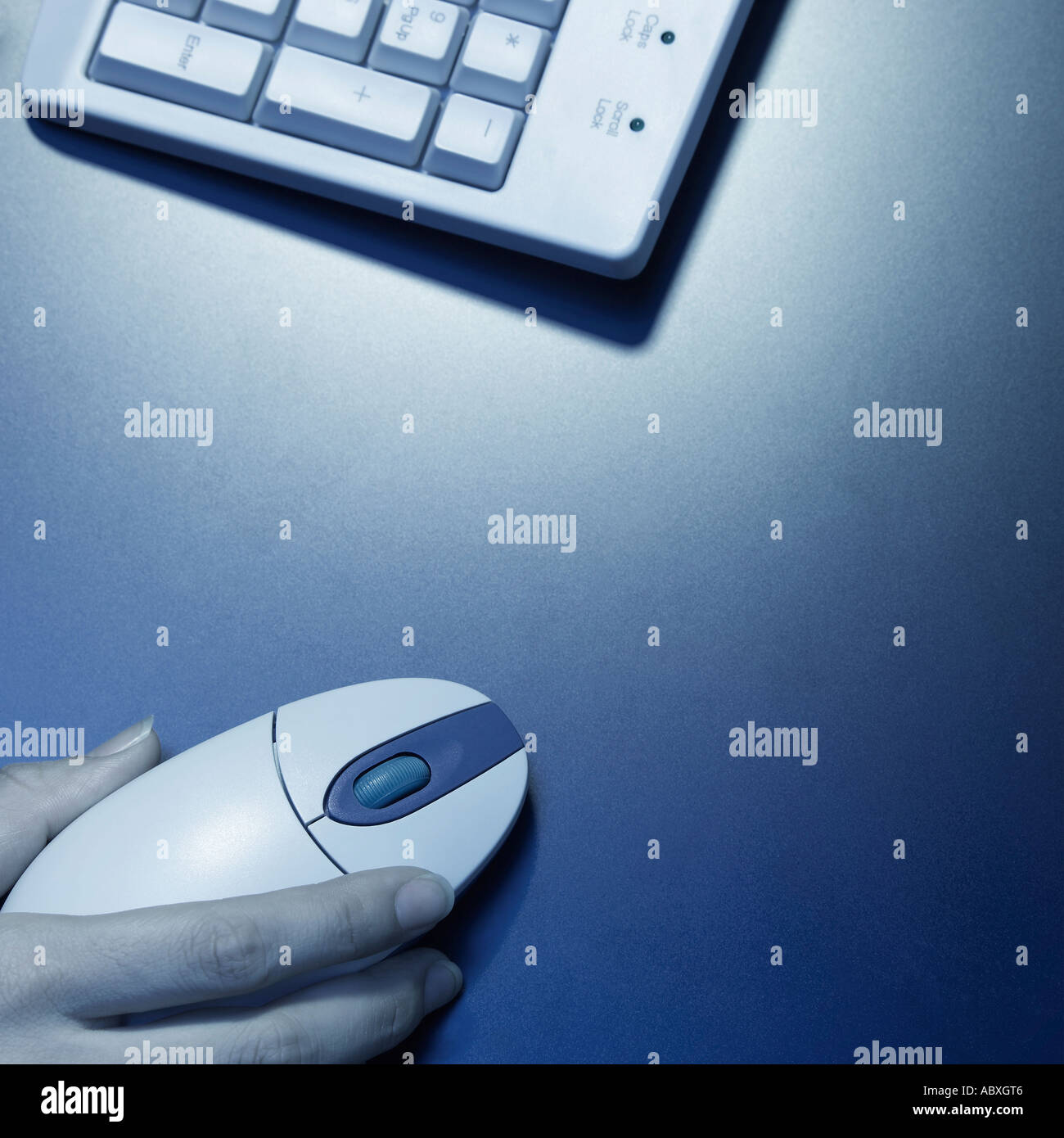 A man using computer mouse Stock Photo - Alamy