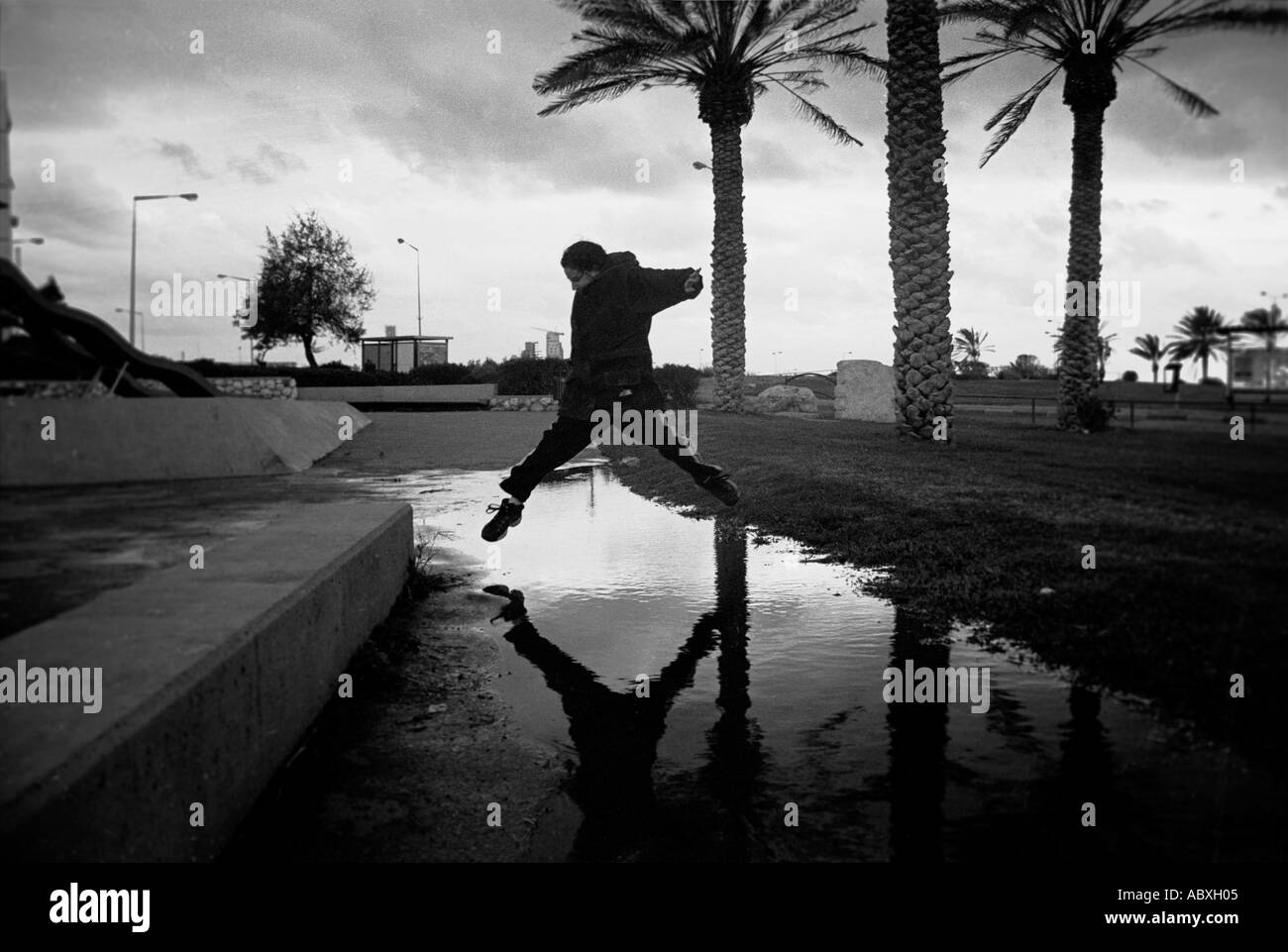 Child puddle Black and White Stock Photos & Images - Alamy