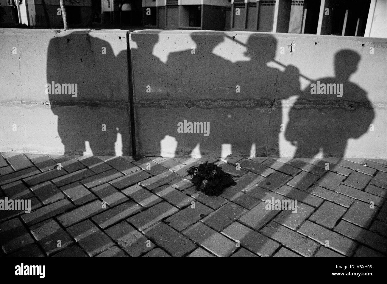 shadows of kids on a wall Stock Photo - Alamy