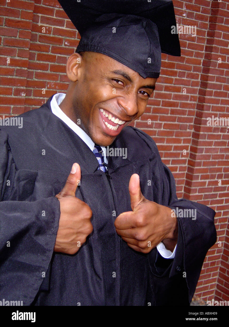 Portrait man wearing graduation cap hi-res stock photography and images ...
