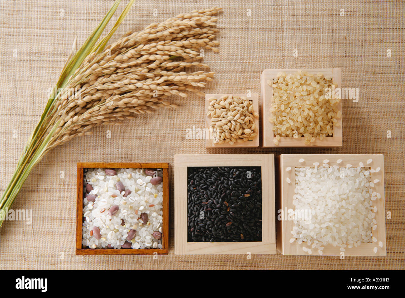 Assorted uncooked rice in cups Stock Photo - Alamy