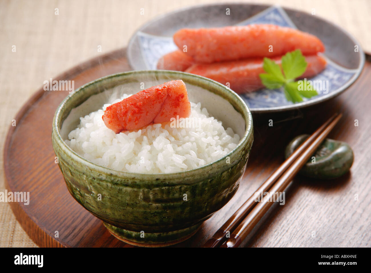 Spicy cod roe on top of steamed rice Stock Photo - Alamy