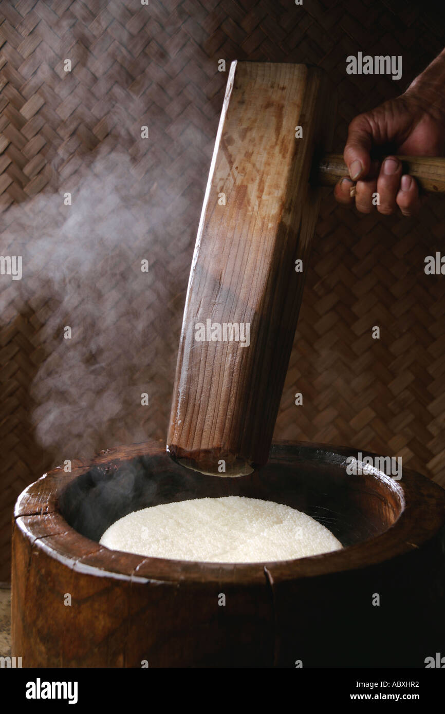 Steamed rice in mortar Stock Photo - Alamy