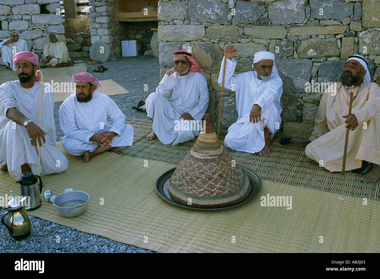 UAE Dubai group of men relaxing Stock Photo - Alamy
