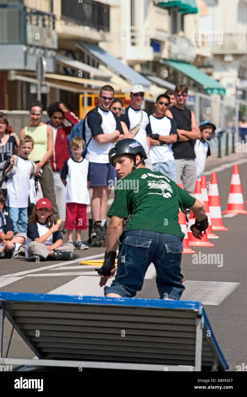 Roller skater jumping a ramp Stock Photo - Alamy
