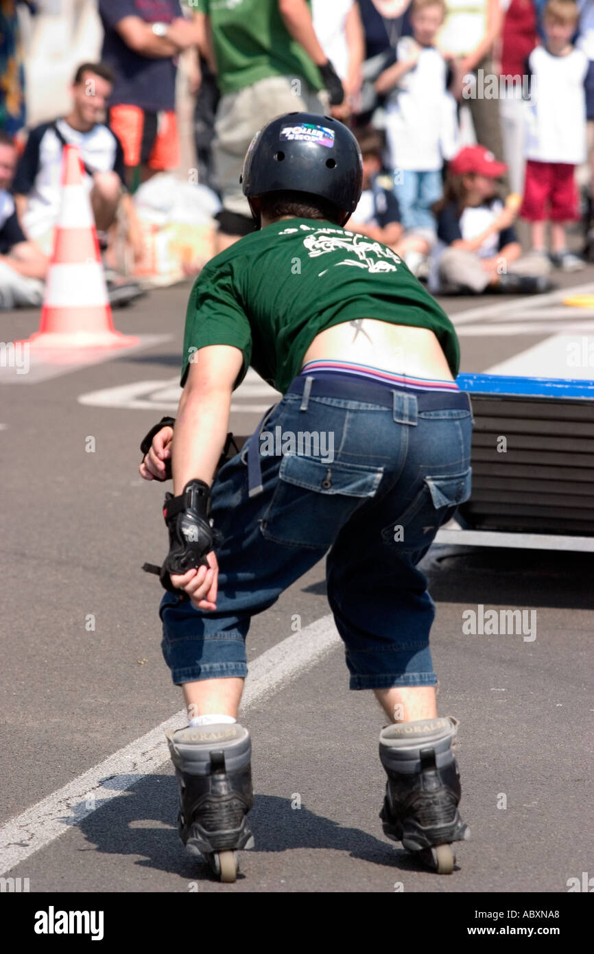 Roller skater jumping a ramp Stock Photo - Alamy