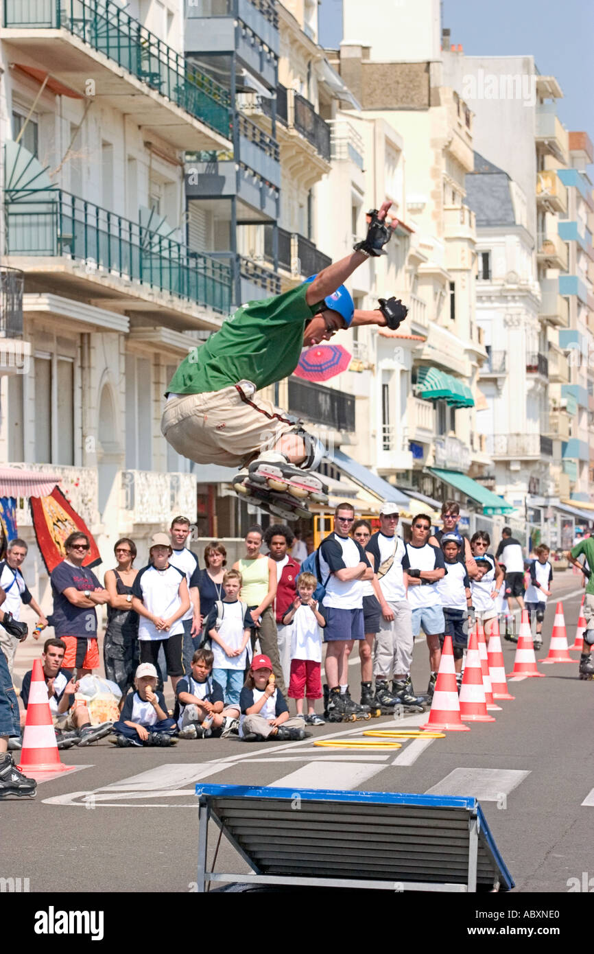 Roller skater jumping a ramp Stock Photo - Alamy