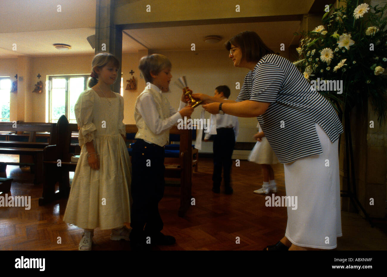 Taking communion hi-res stock photography and images - Alamy