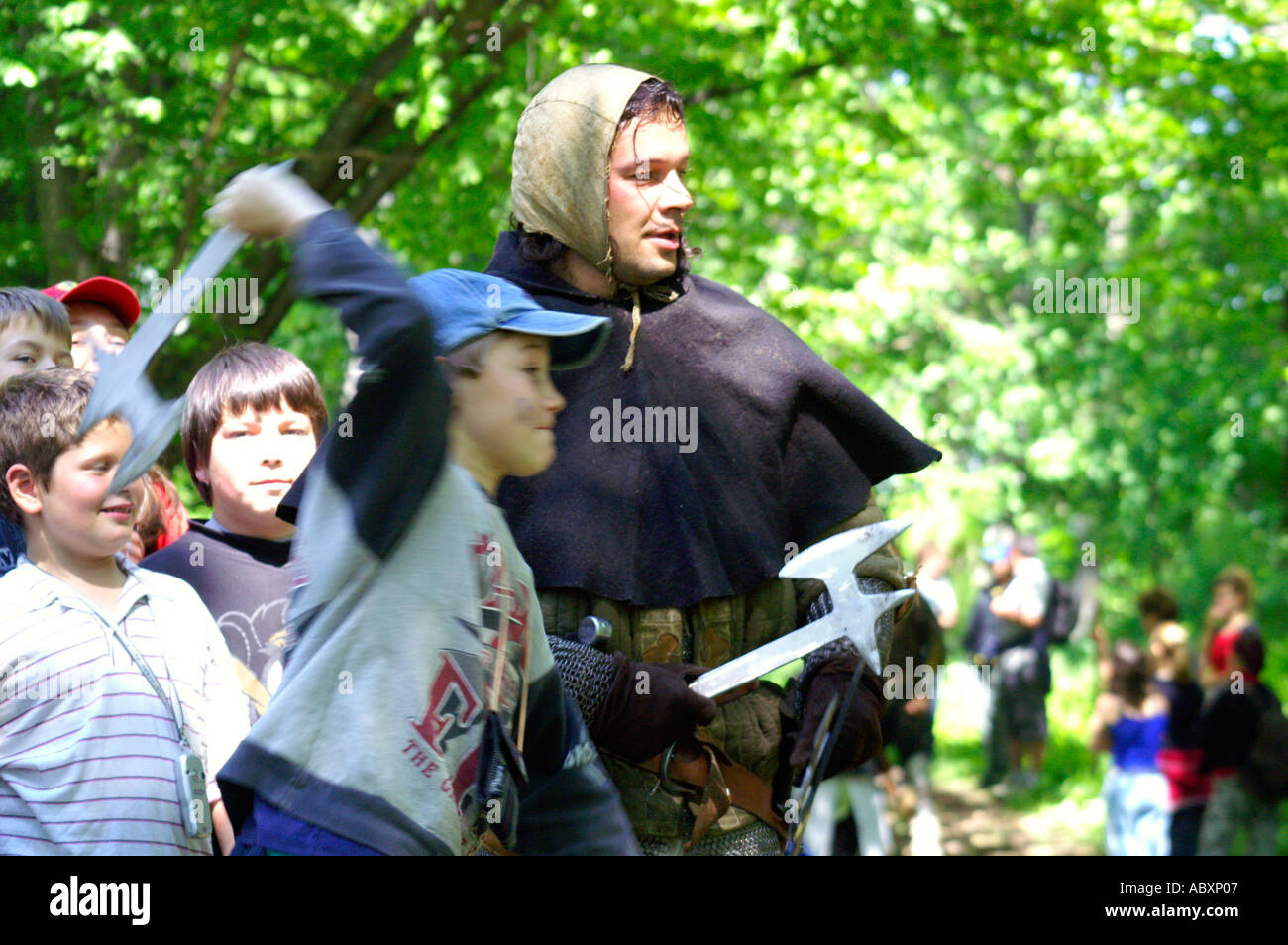 Children Throwing an Axe at Muran Castle historic festival, Slovakia ...