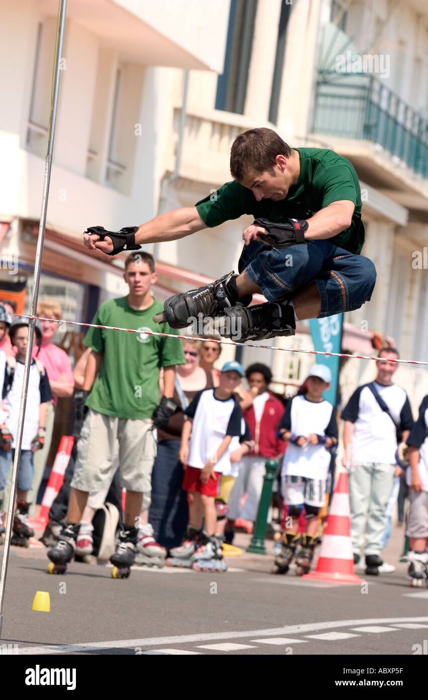 Roller skater jumping a ramp Stock Photo - Alamy