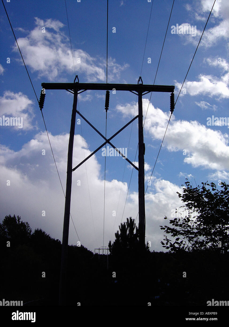 Rural Scene of a Silhouette of an Electricity Pylon Tower Against a ...