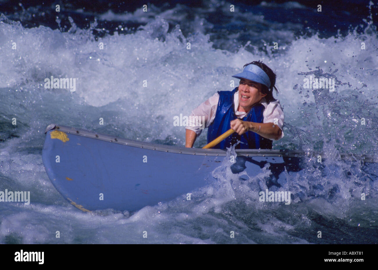 woman whitewater canoeing Martins Rapids McKenzie River Oregon USA ...
