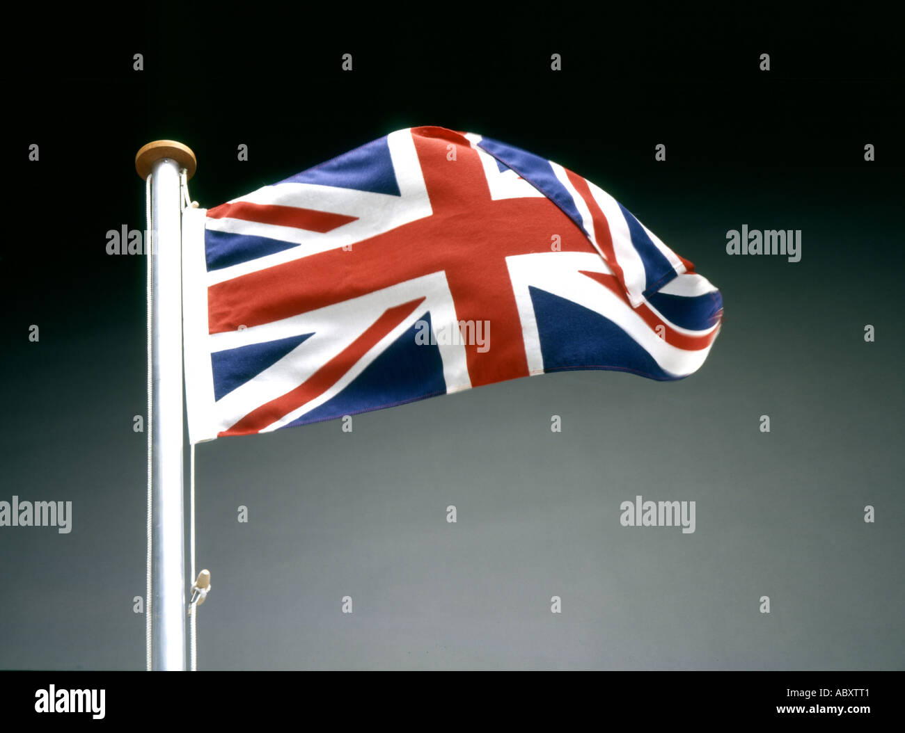 Union Jack flag flying on a flagpole Stock Photo - Alamy