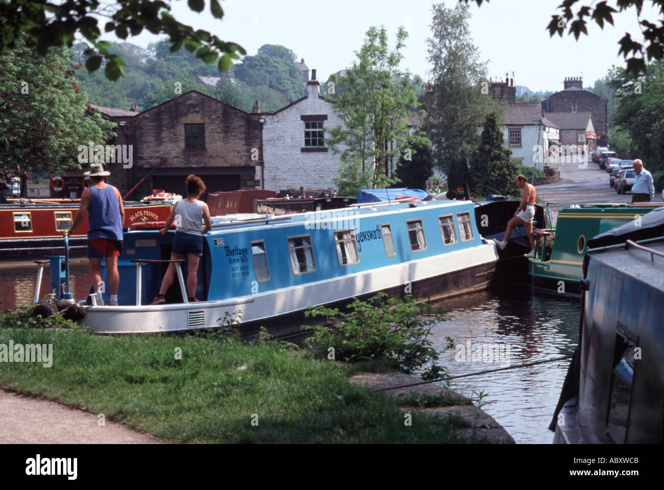 Narrowboat turning at the Canal Basin, Peak Forest Canal, Whaley Bridge ...