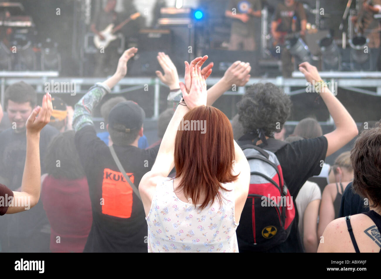 Woman dancing outdoor rock concert hi-res stock photography and images ...